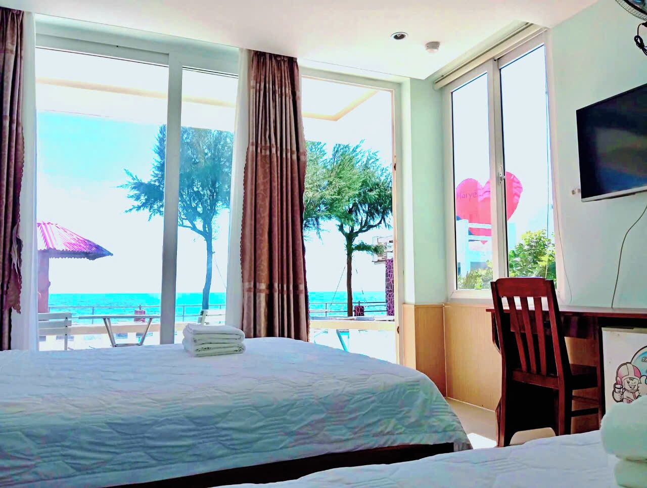 Quarto Familiar, vista para o mar | 1 quarto, roupa hipoalergénica, minibar, secretária 