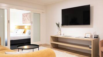 Suite Familiar, 2 quartos, não fumadores, kitchenette (Family Unit) | Ferro/tábua de engomar, Wi-fi grátis, roupa de cama fornecida