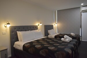 Quarto Triplo Deluxe | Quartos insonorizados, Wi-fi grátis, roupa de cama fornecida 