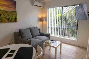 Suíte executiva | Área de estar | TV LCD 40 polegadas com canais digitais, TV