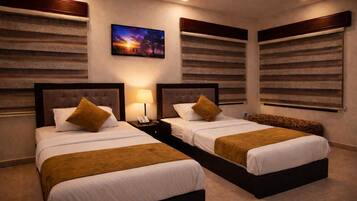 Quarto Twin Deluxe, 2 camas individuais, Vista para a cidade | Roupa hipoalergénica, secretária, quartos insonorizados, Wi-fi grátis