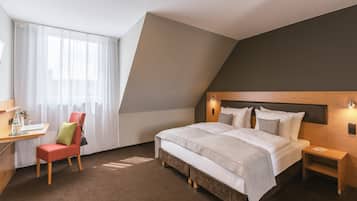 Secretária, quartos insonorizados, Wi-fi grátis