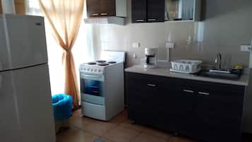 Suíte superior, 2 quartos | Cozinha privada