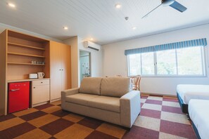 Suíte estúdio | Área de estar | Smart TV 45 polegadas com canais digitais