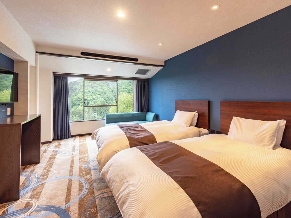 Quarto duplo, para não fumantes (2semi double beds) | Cofres nos quartos, escrivaninha, Wi-Fi de cortesia, roupa de cama