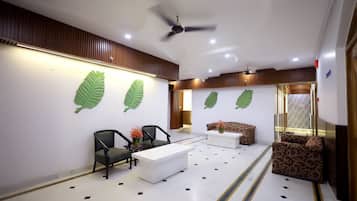 Quarto casal luxo | Área de estar
