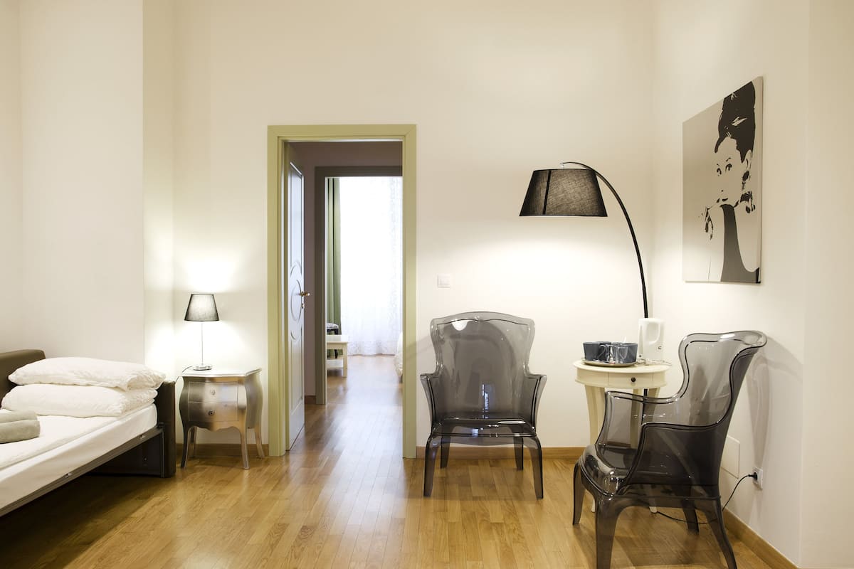 Quarto família, 2 quartos | 1 quarto, roupas de cama premium, frigobar, cofres nos quartos