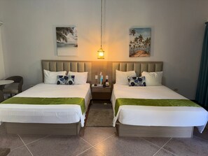 Quarto standard | Individualmente mobiliados, escrivaninha, ferros/tábuas de passar roupa