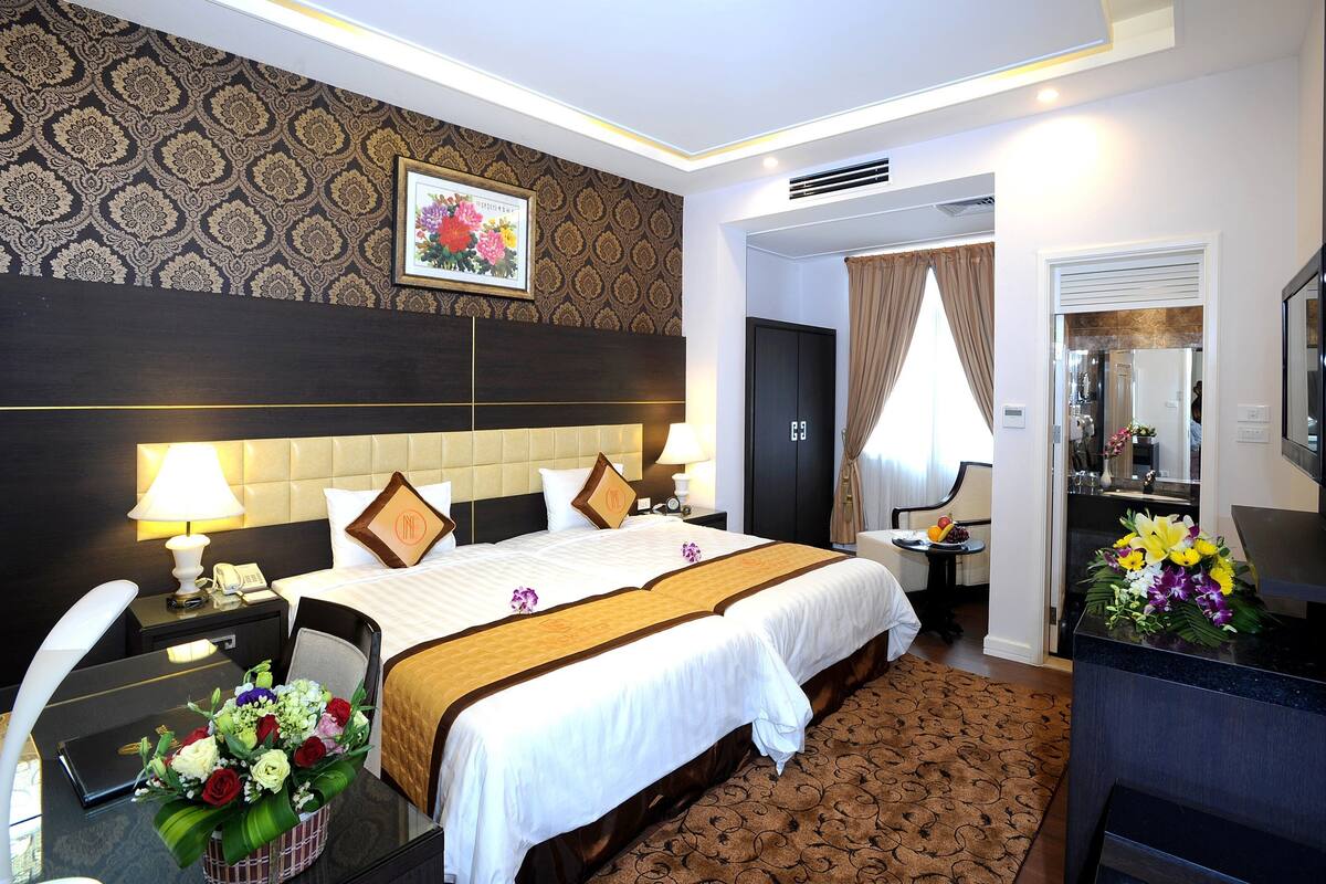 Quarto Duplo ou Twin Deluxe, 1 quarto, casa de banho privativa, vista para o pátio | 1 quarto, minibar, cofre no quarto, secretária 