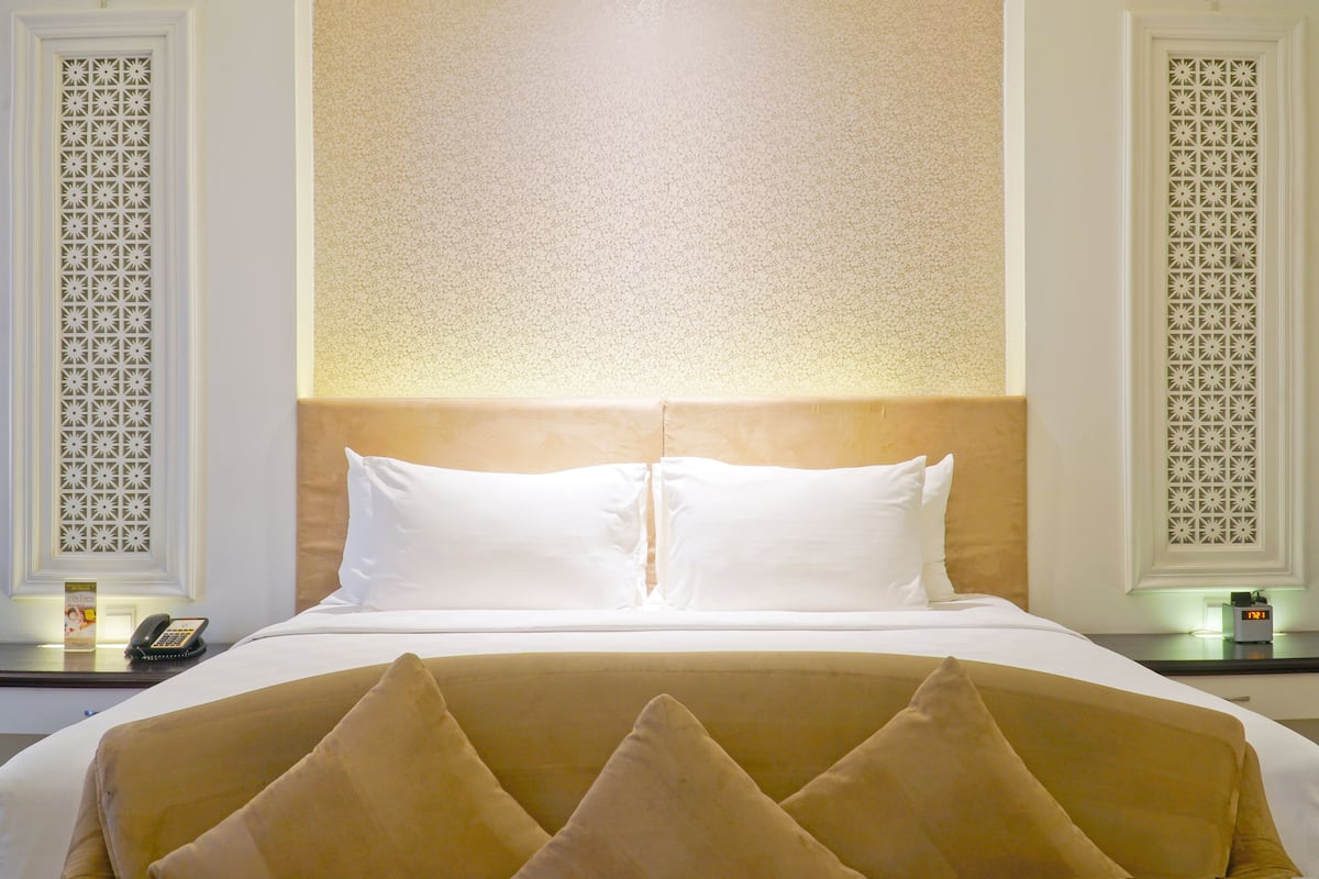 Suíte executiva | Roupas de cama premium, cofres nos quartos, escrivaninha