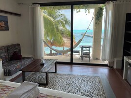 Suite Romântica, vista para a praia | Minibar, cortinas/cortinados opacos, quartos insonorizados