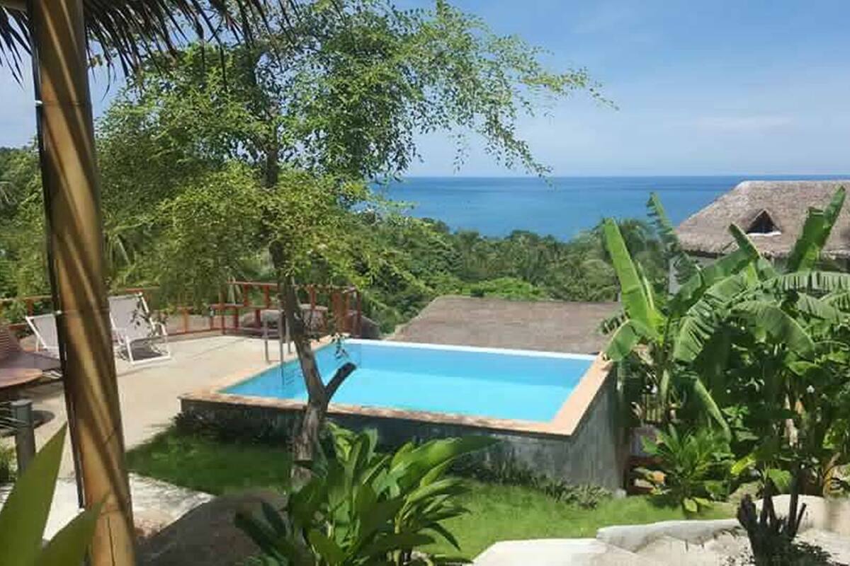 Sunrise Bungalow with Total Ocean View | Cofre no quarto, berços/camas para crianças, Wi-fi grátis 