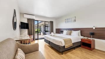 Deluxe King Room | Secretária, cortinas/cortinados opacos, quartos insonorizados