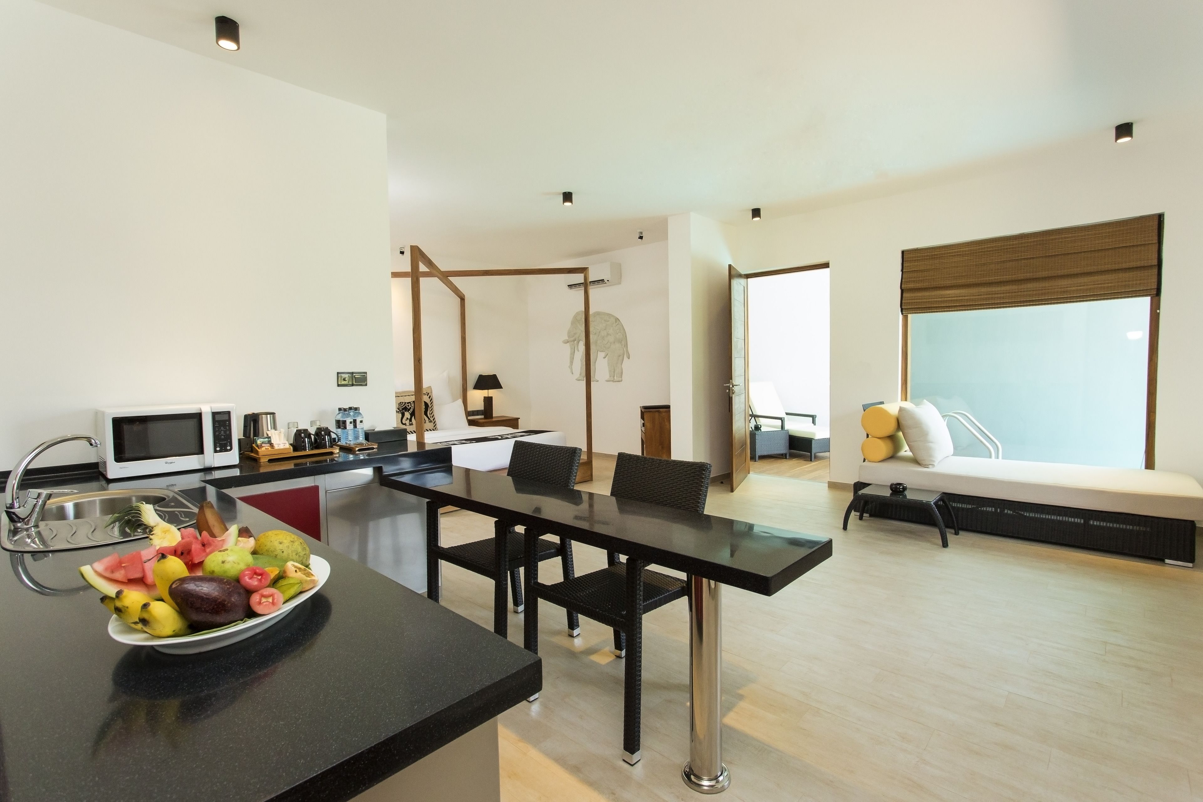 Suite with Free Benefits | Sala de estar | TV LED 32 polegadas com canais digitais