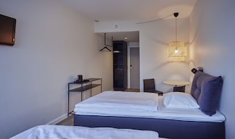 Quarto Twin, vista para o mar | Wi-fi grátis, roupa de cama fornecida