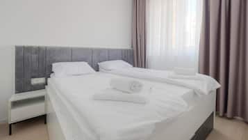 Apartamento luxo | 2 quartos, escrivaninha, espaço de trabalho para notebook