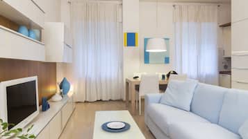 Apartamento Comfort | Sala de estar | TV de ecrã plano