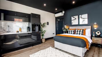 Suíte estúdio premier, 1 cama de casal, cozinha, vista para o mar | Cozinha privada | Geladeira, micro-ondas, fogão, cooktop