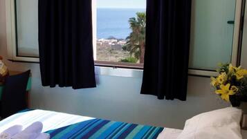 Condo família, vista para o mar | Quartos à prova de som, Wi-Fi de cortesia