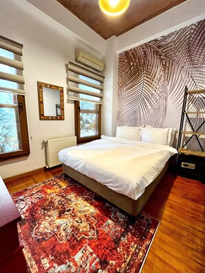 Quarto luxo | Roupas de cama premium, frigobar, escrivaninha