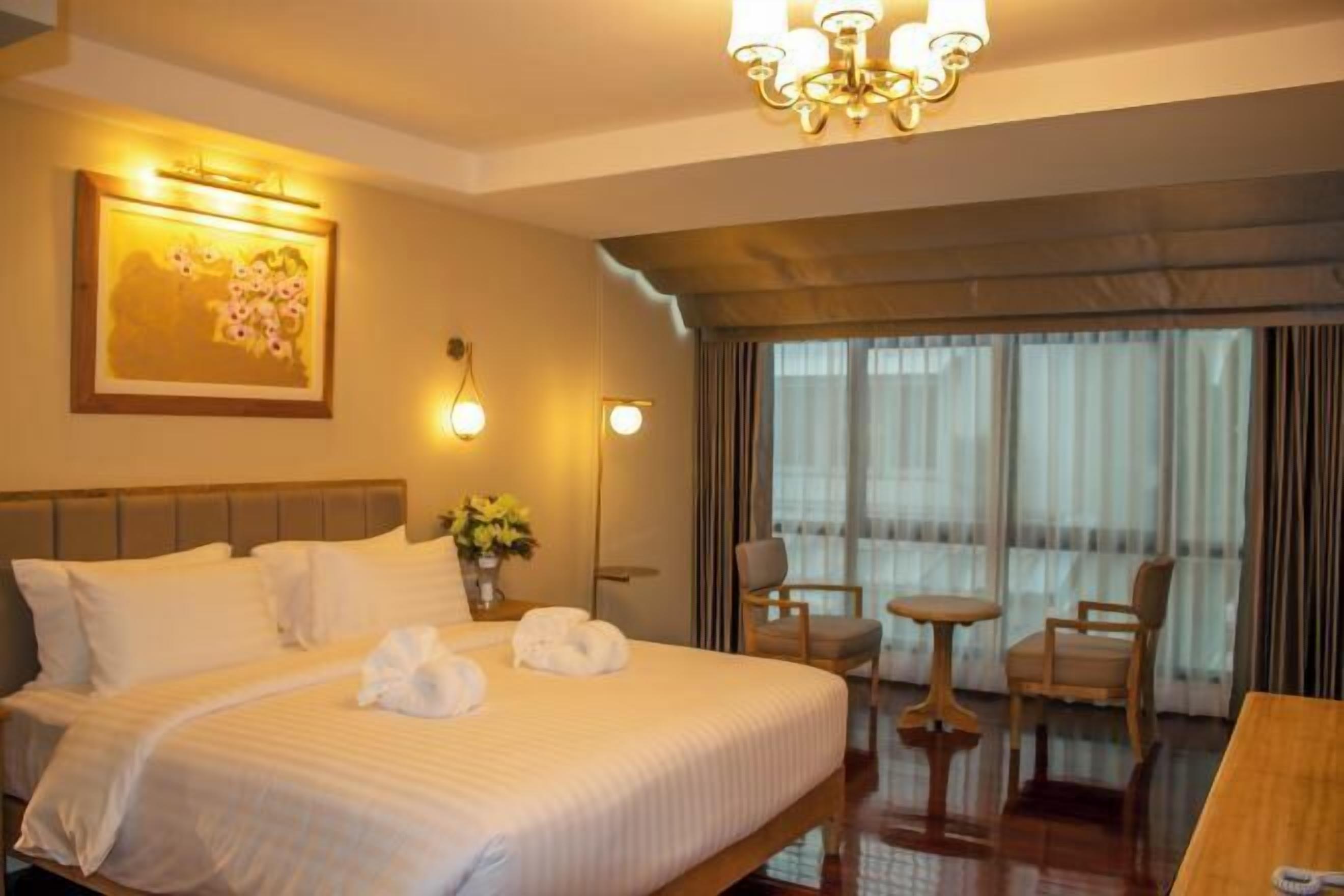 Roupas de cama premium, cofres nos quartos, individualmente decorados