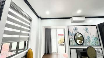 Quarto de Luxo | Sala de estar | Smart TV