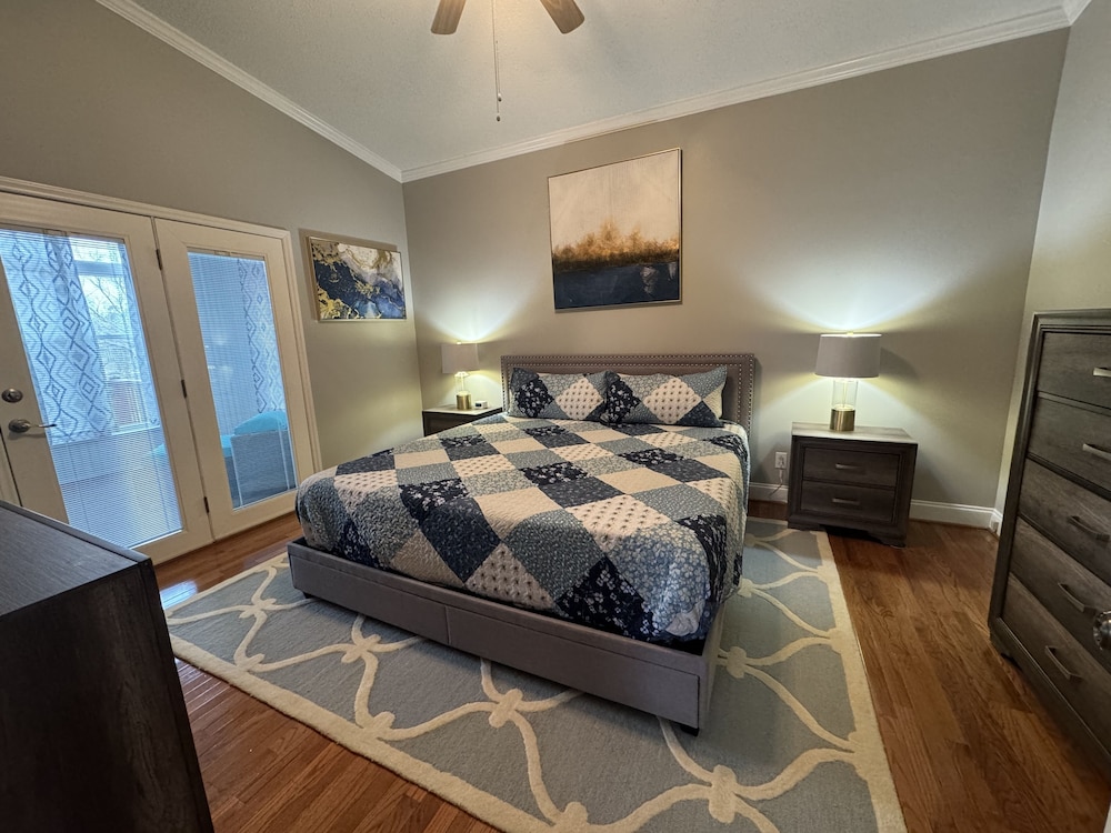 Boat slip and jet ski float on private dock at waterfront house ...