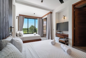 Quarto família | Roupas de cama premium, cofres nos quartos, individualmente mobiliados
