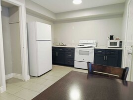 Apartamento, 2 quartos, cozinha | Ferros/tábuas de passar roupa, Wi-Fi de cortesia, roupa de cama