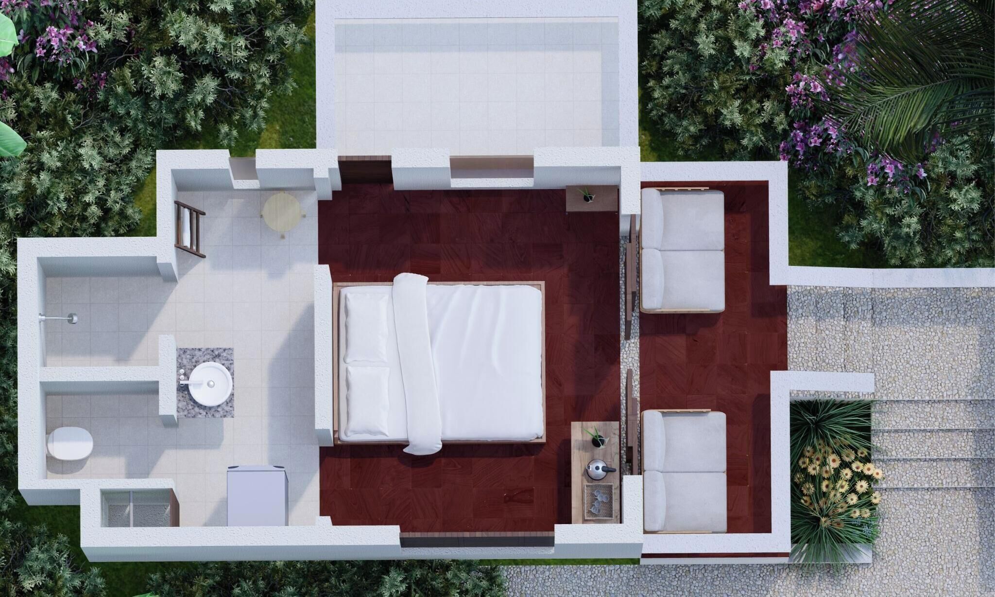 Vista aérea de um quarto moderno de hotel com uma cama grande, área de estar e um banheiro pequeno.