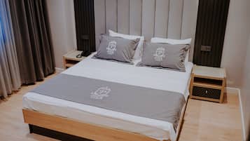 Quarto Deluxe | 1 quarto, cofre no quarto, secretária