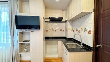 Quarto superluxo | Cozinha privada | Refrigerador em uma área comum