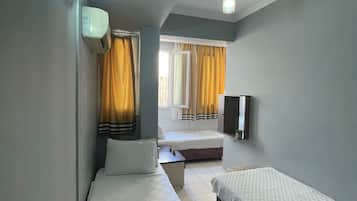 Quarto Triplo Cidade | 1 quarto, roupa de alta qualidade, ferro/tábua de engomar, Wi-fi grátis