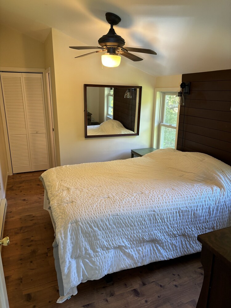 Enjoy a spectacular view of Burden Lake, NY while relaxing inside or ...