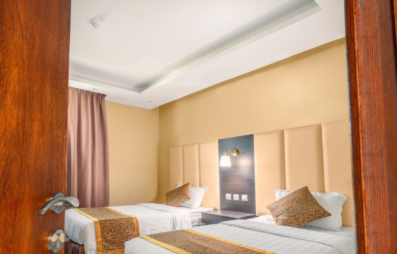 Apartamento família | Frigobar, ferros/tábuas de passar roupa, Wi-Fi de cortesia