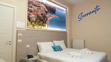 Quarto superior | Banheiro | Chuveiro, chuveiro com efeito de chuva, toalhas de banho
