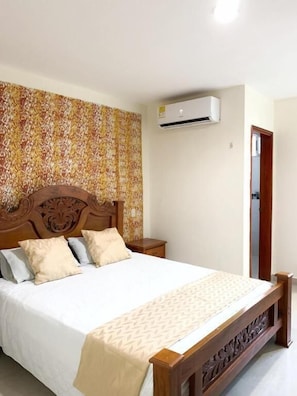 Quarto triplo standard | Roupa de cama