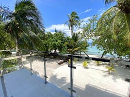 Quarto família | Vista para praia/oceano
