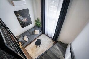 Apartamento luxo | Área de estar | TV de tela plana