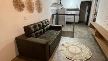 Apartamento | Área de estar | TV LED 32 polegadas com canais digitais, Netflix, serviços de streaming