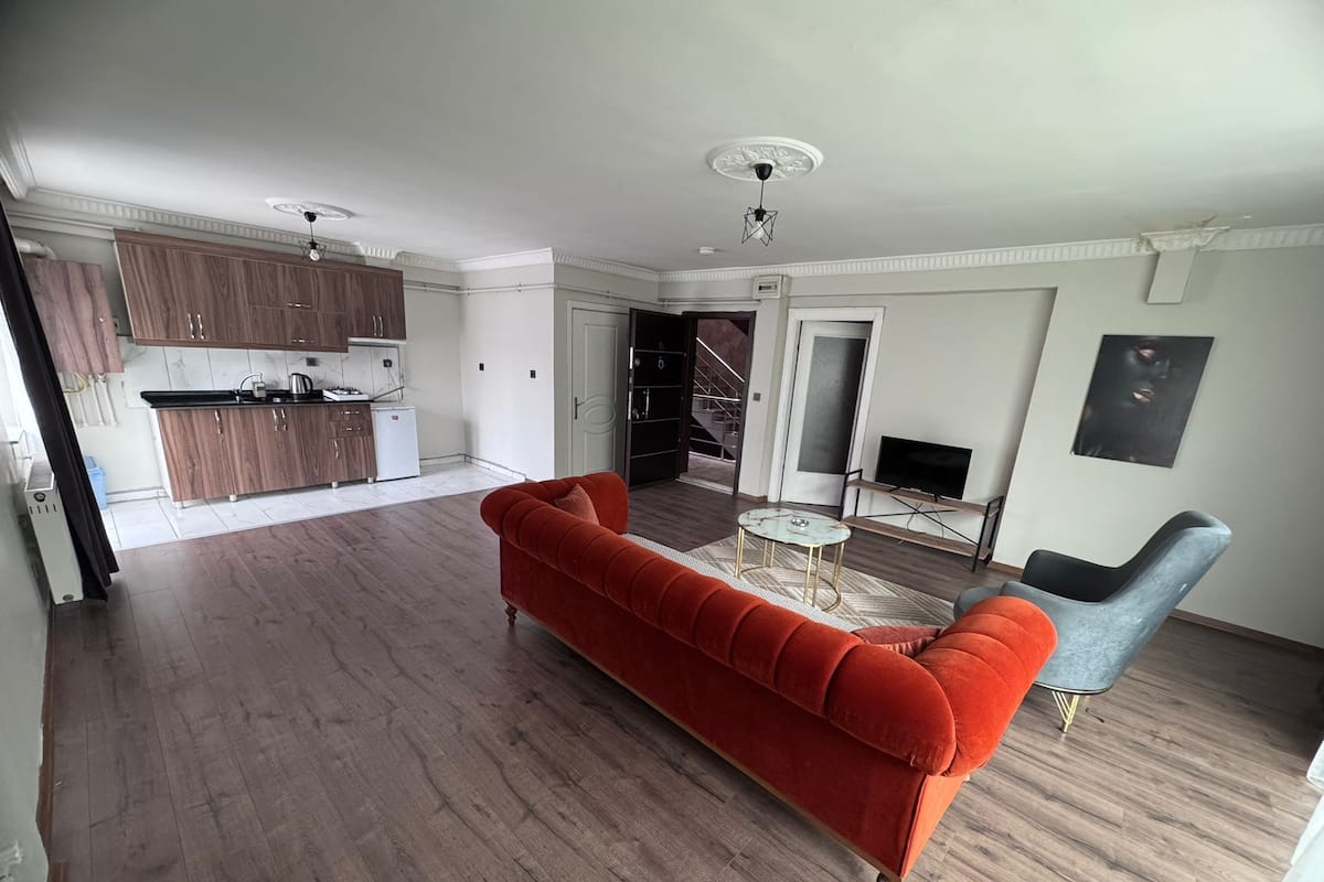 Apartamento Deluxe | Sala de estar