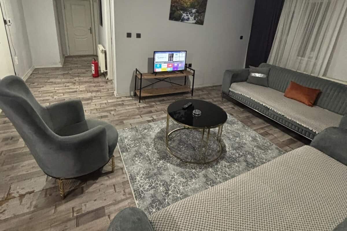 Apartamento Familiar, 2 quartos, Vista para a cidade | Sala de estar