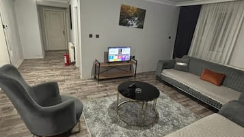 Apartamento Familiar, 2 quartos, Vista para a cidade | Sala de estar