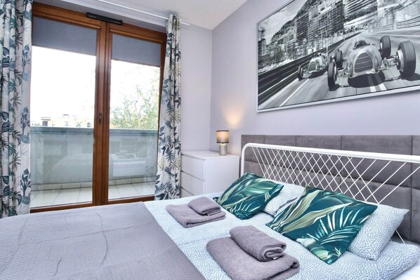 Condo família | 2 quartos, ferros/tábuas de passar roupa, Wi-Fi de cortesia