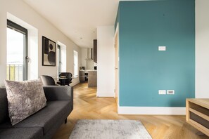 Apartamento, 1 quarto, sacada | Área de estar | TV de tela plana 40 polegadas com canais digitais