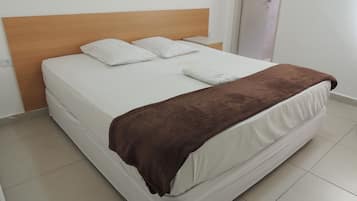 Wi-Fi de cortesia, roupa de cama
