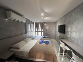 Estúdio conforto | Cortinas blackout, ferros/tábuas de passar roupa, Wi-Fi de cortesia