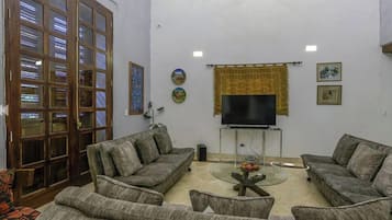 Apartamento, 3 quartos | Sala