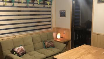 Apartamento Comfort, 2 quartos, kitchenette, junto ao pátio | Sala de estar