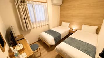 Cortinas blackout, Wi-Fi de cortesia, roupa de cama
